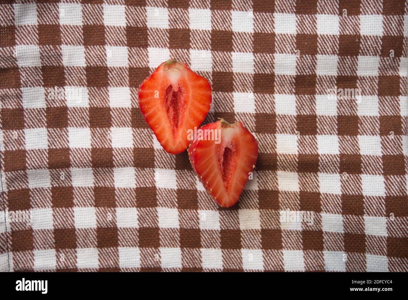 strawberry on checkered fabric Stock Photo - Alamy