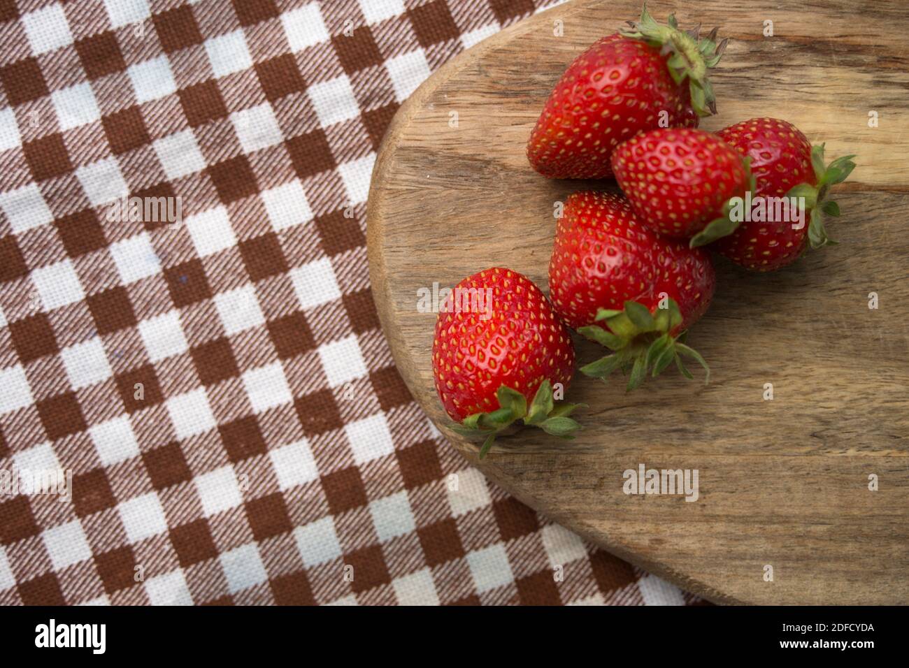 strawberry on checkered fabric Stock Photo - Alamy