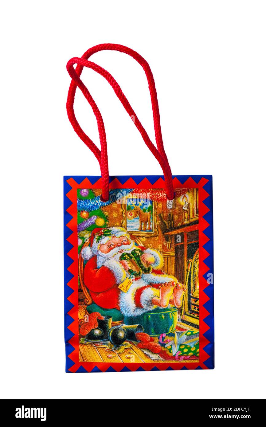 Christmas gift bag with Father Christmas Santa Claus on isolated on ...