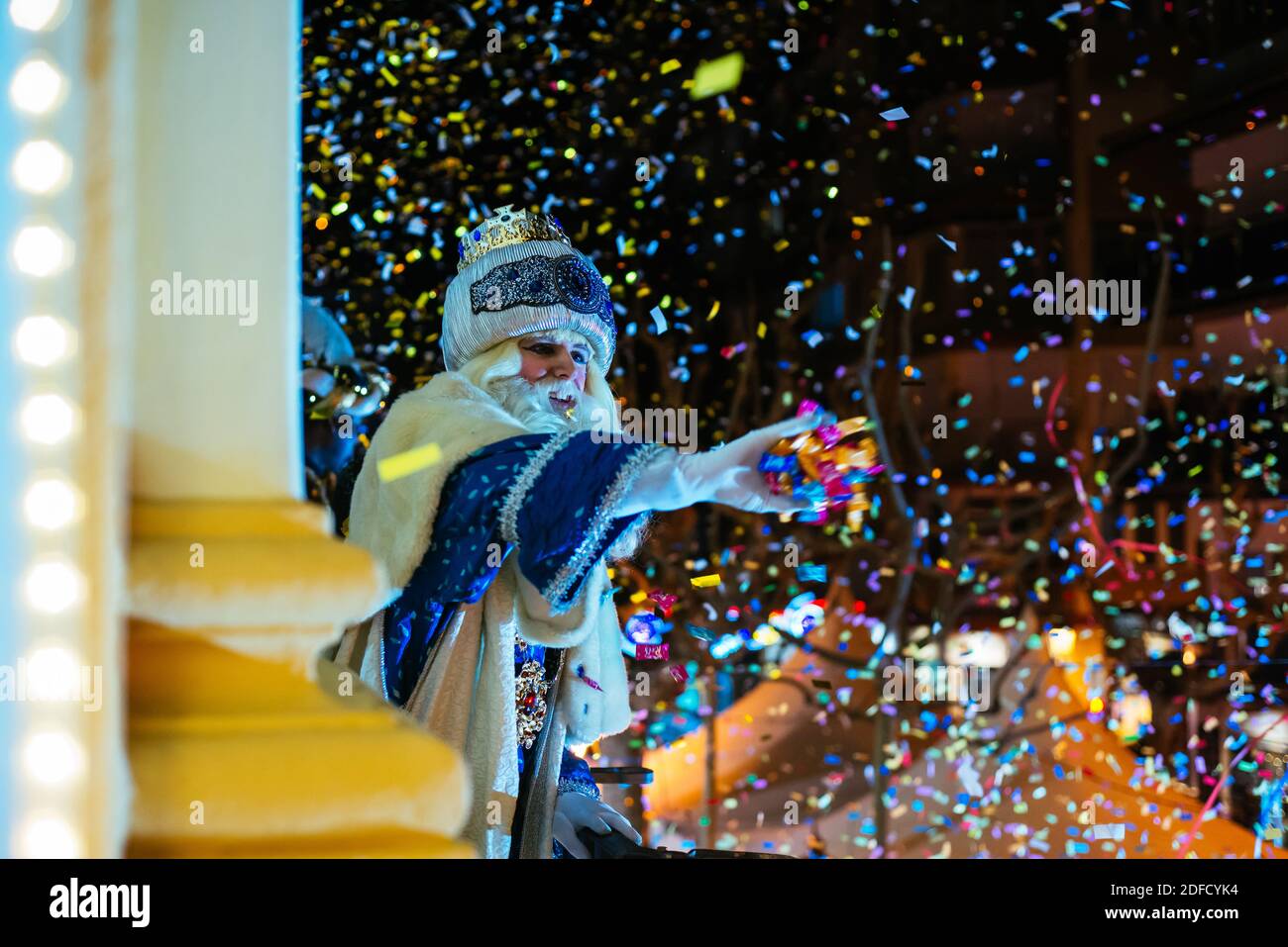 One of the three kings throwing candies from a balcony - the Epiphany ...