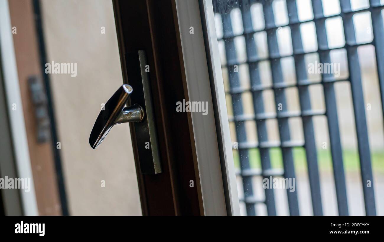 Window handle detail in a house interior with low light Stock Photo - Alamy