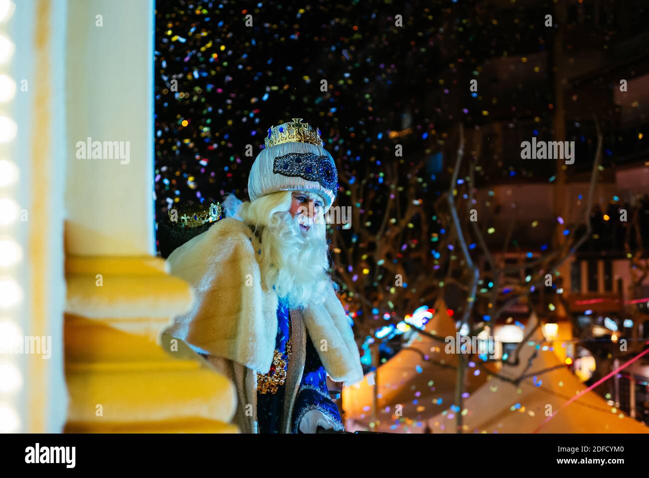 One of the three kings throwing candies from a balcony - the Epiphany ...