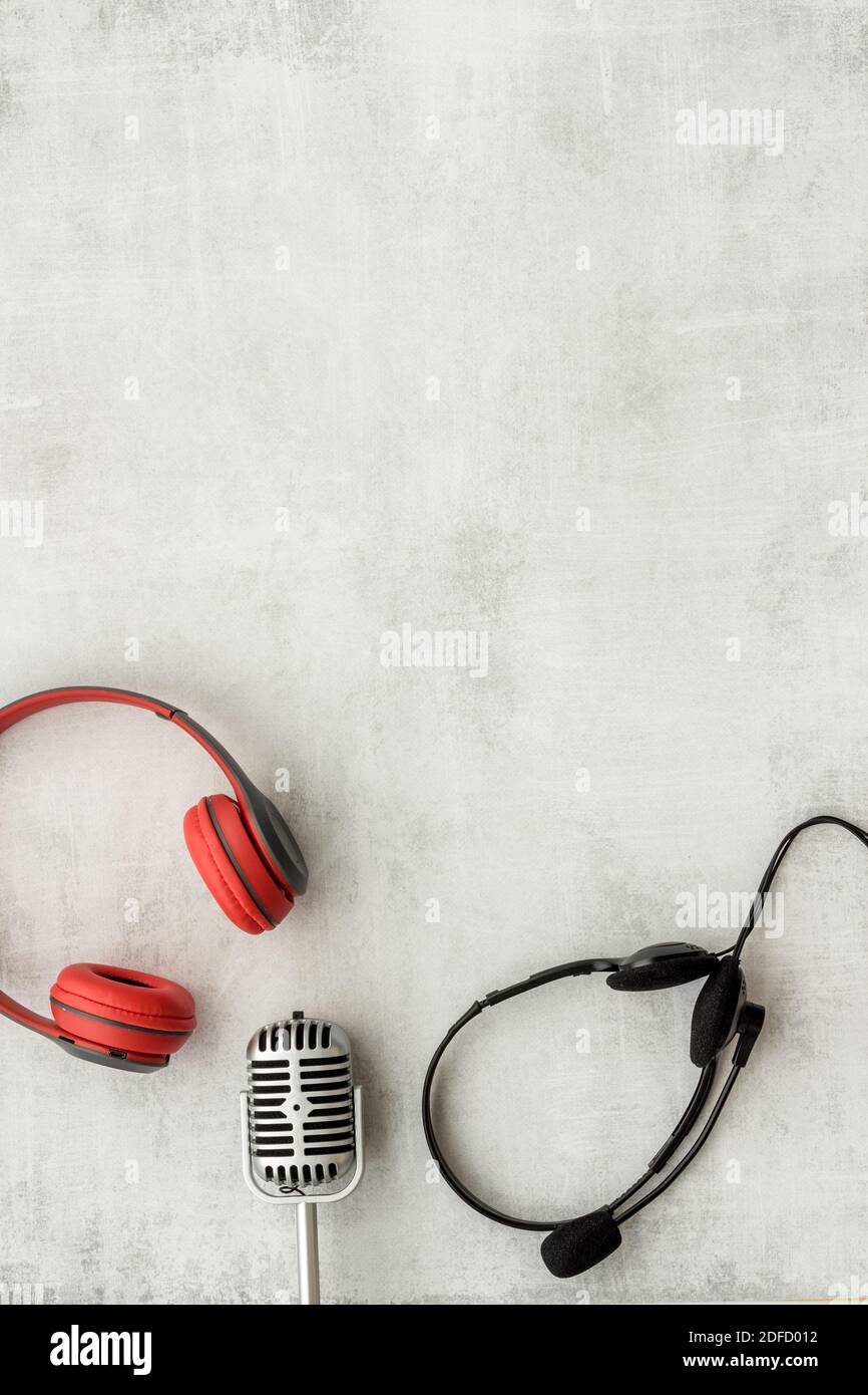 Studio microphone and headphones, top view. Recording podcast and ...