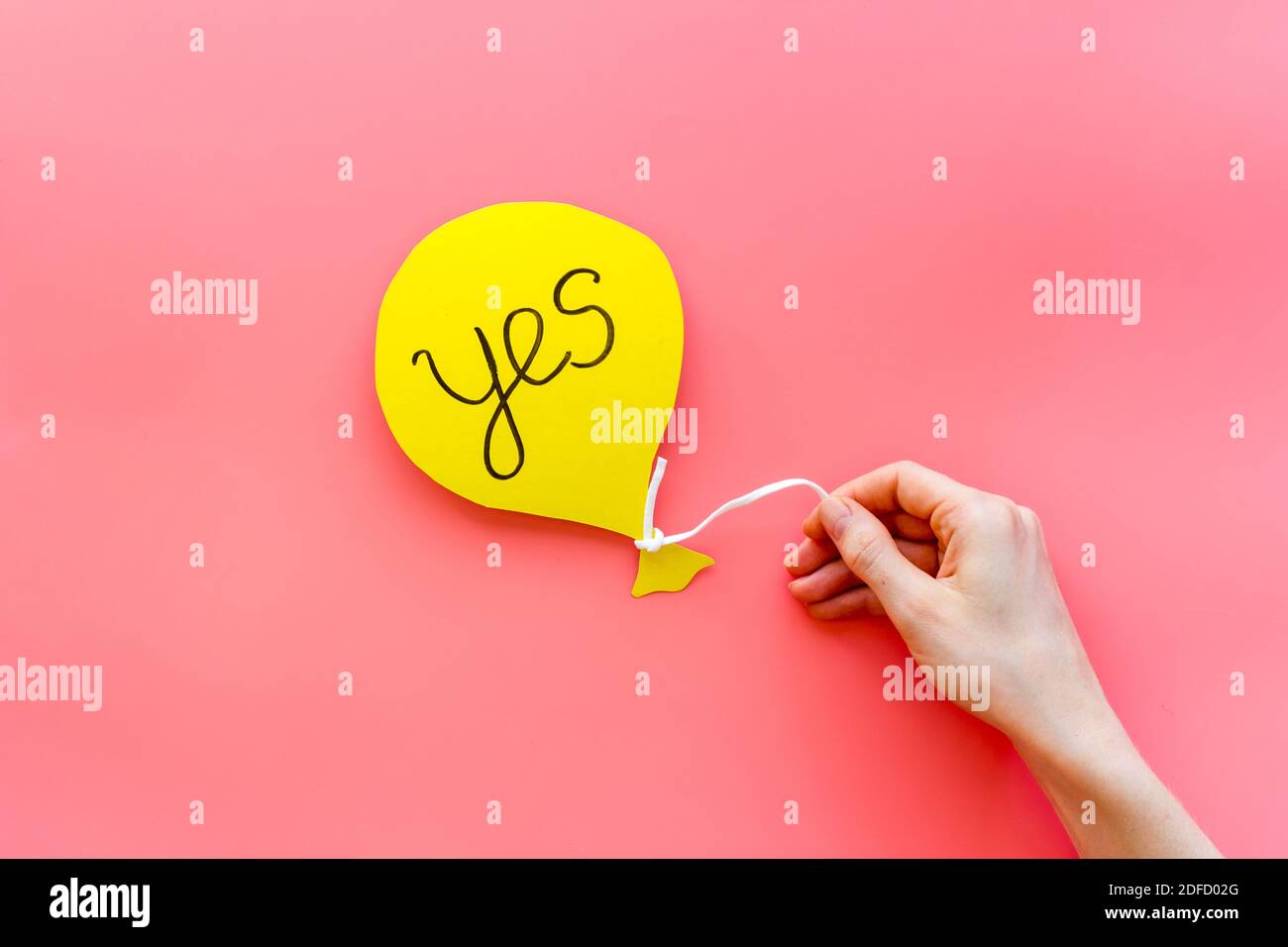 Yes agreement - decision concept. Word Yes on paper banner, top view ...