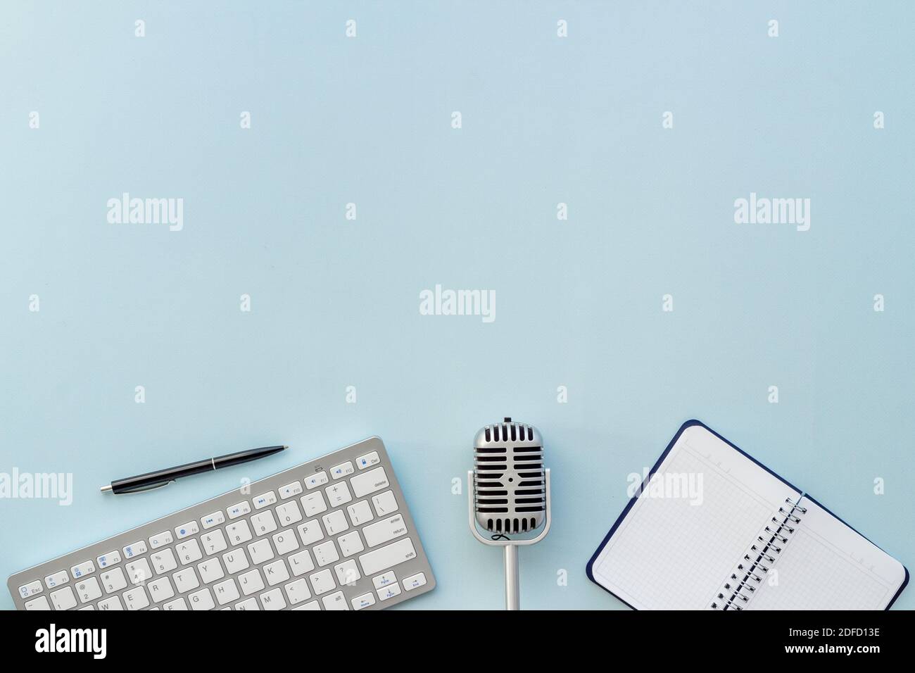 Microphone with keyboard on blogger table, flat lay Stock Photo - Alamy