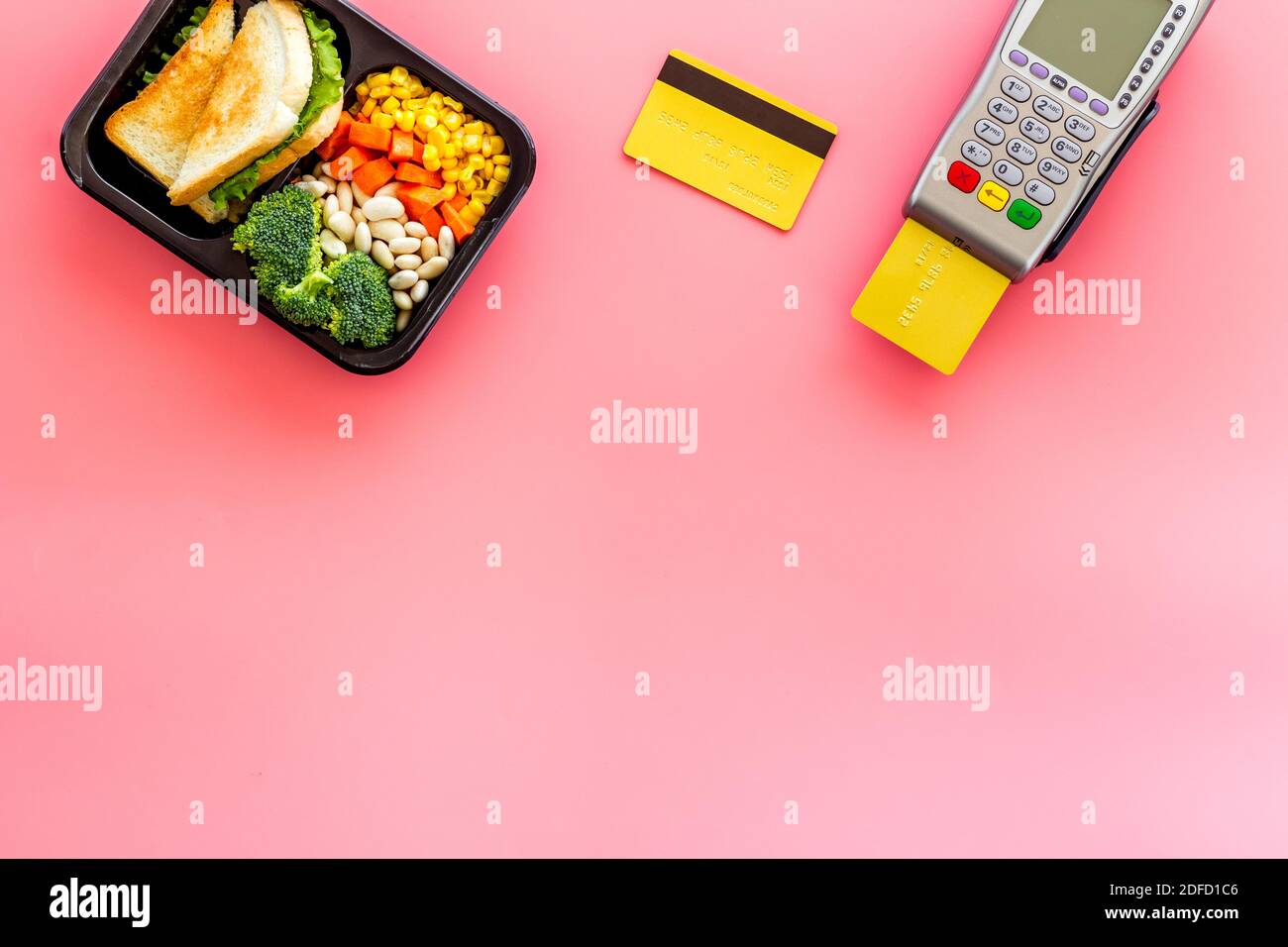 Delivery food is paid with payment terminal and credit card Stock Photo ...