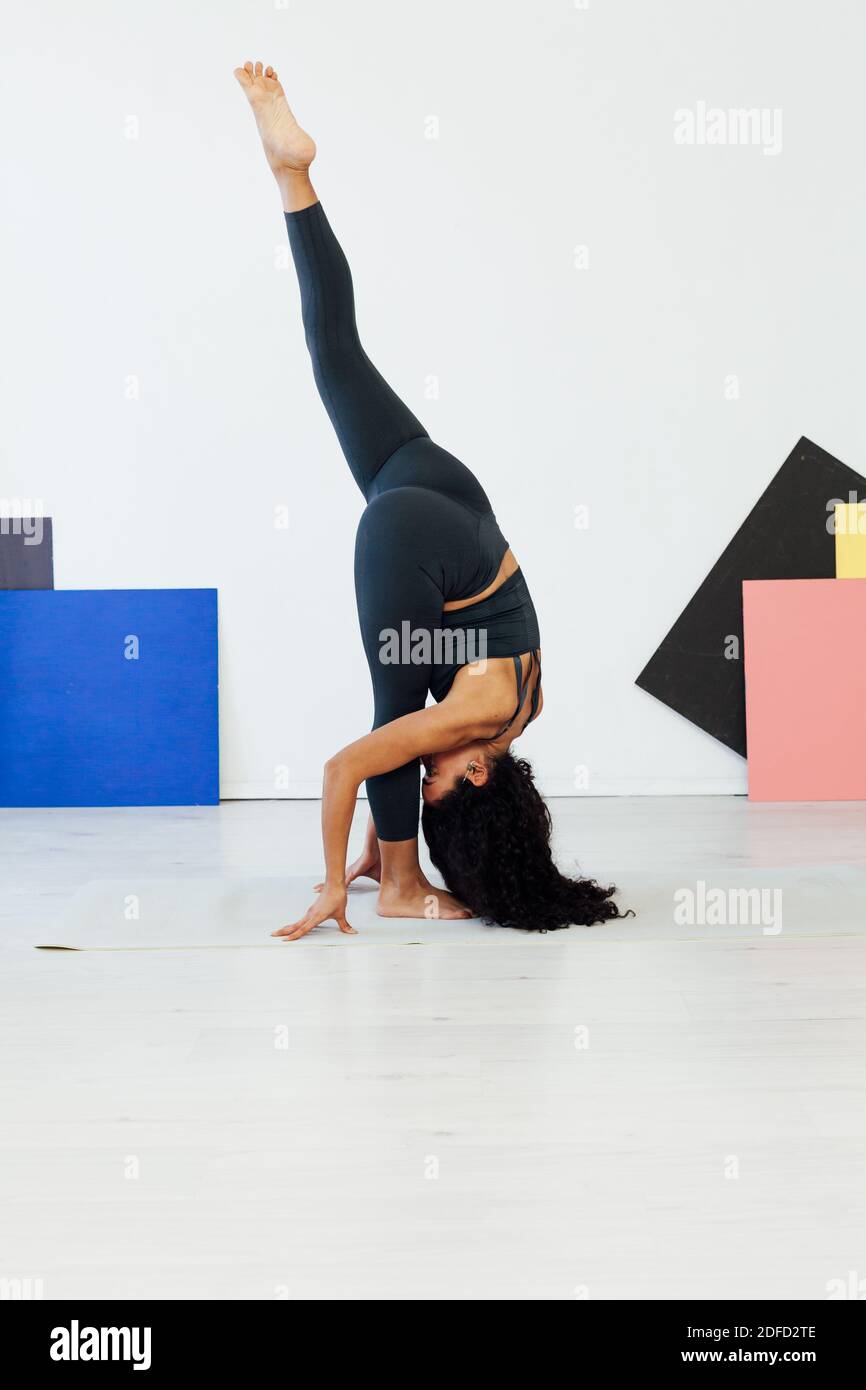 Beautiful flexible woman yoga asana gymnastics body flexibility Stock ...