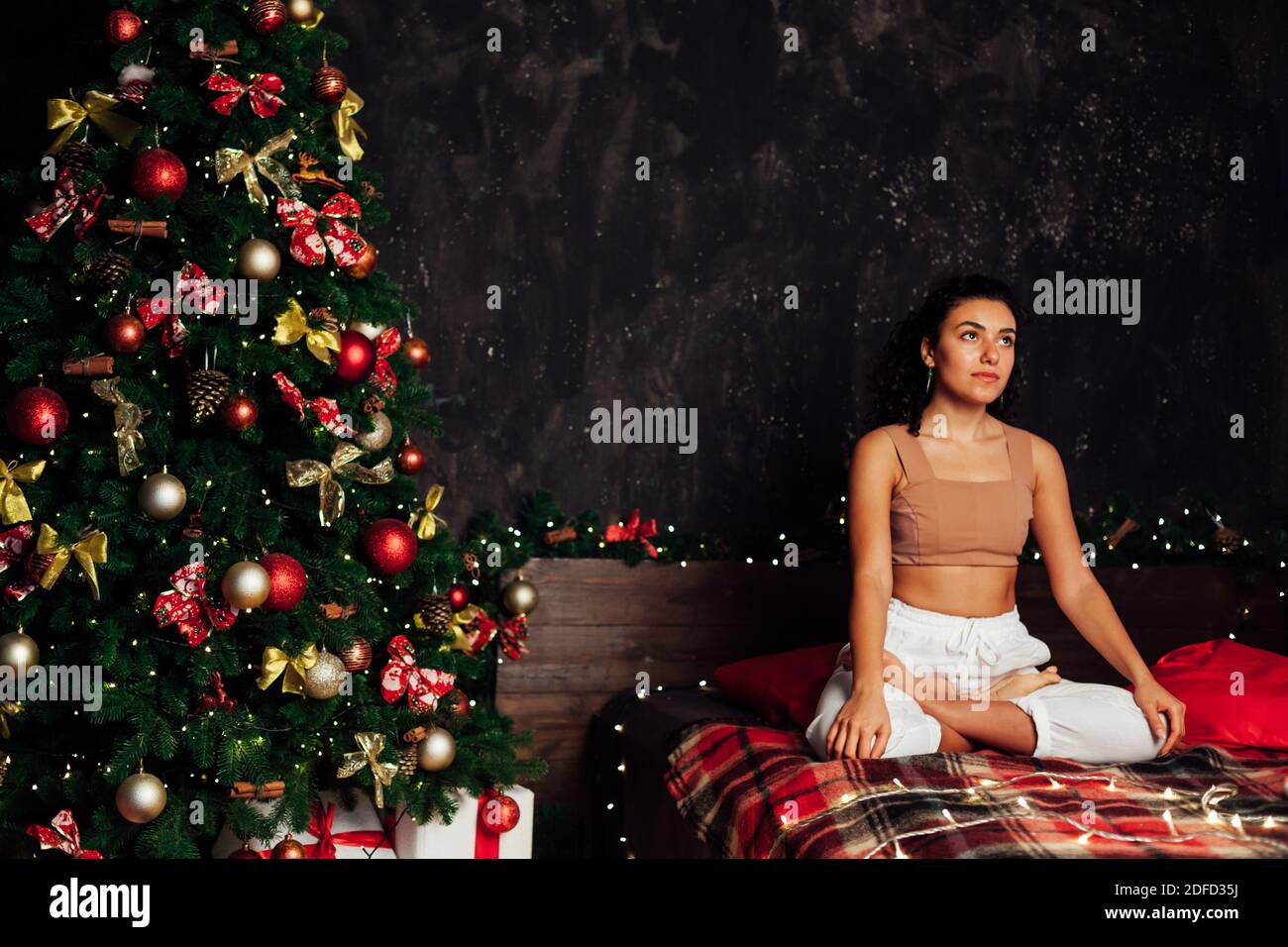 Christmas tree woman yoga asana gymnastics flexibility body new year ...