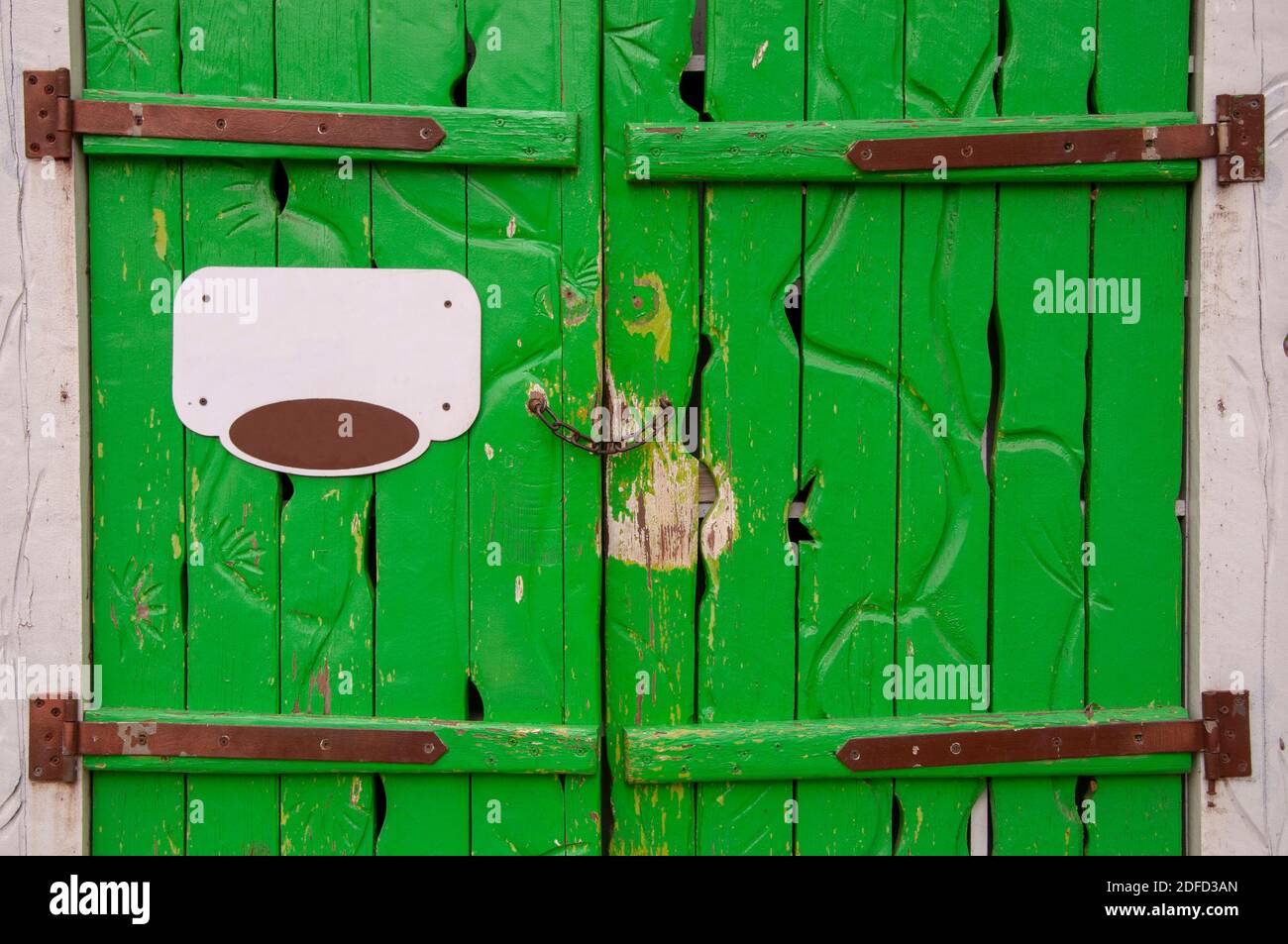 Vintage green wooden gate at the entrance with signage Stock Photo - Alamy