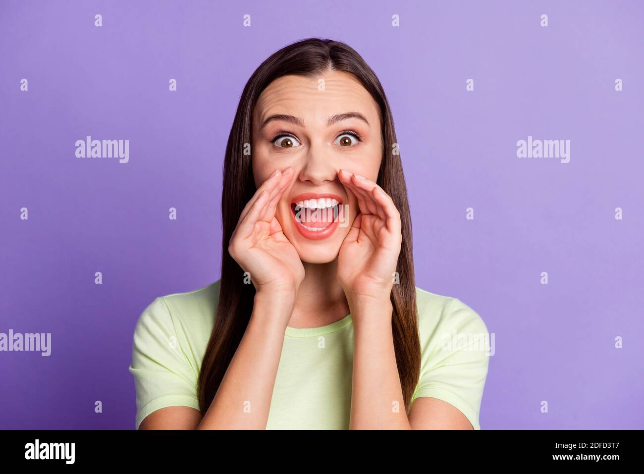 Photo of pretty positive lady hands around open mouth yell wear light ...