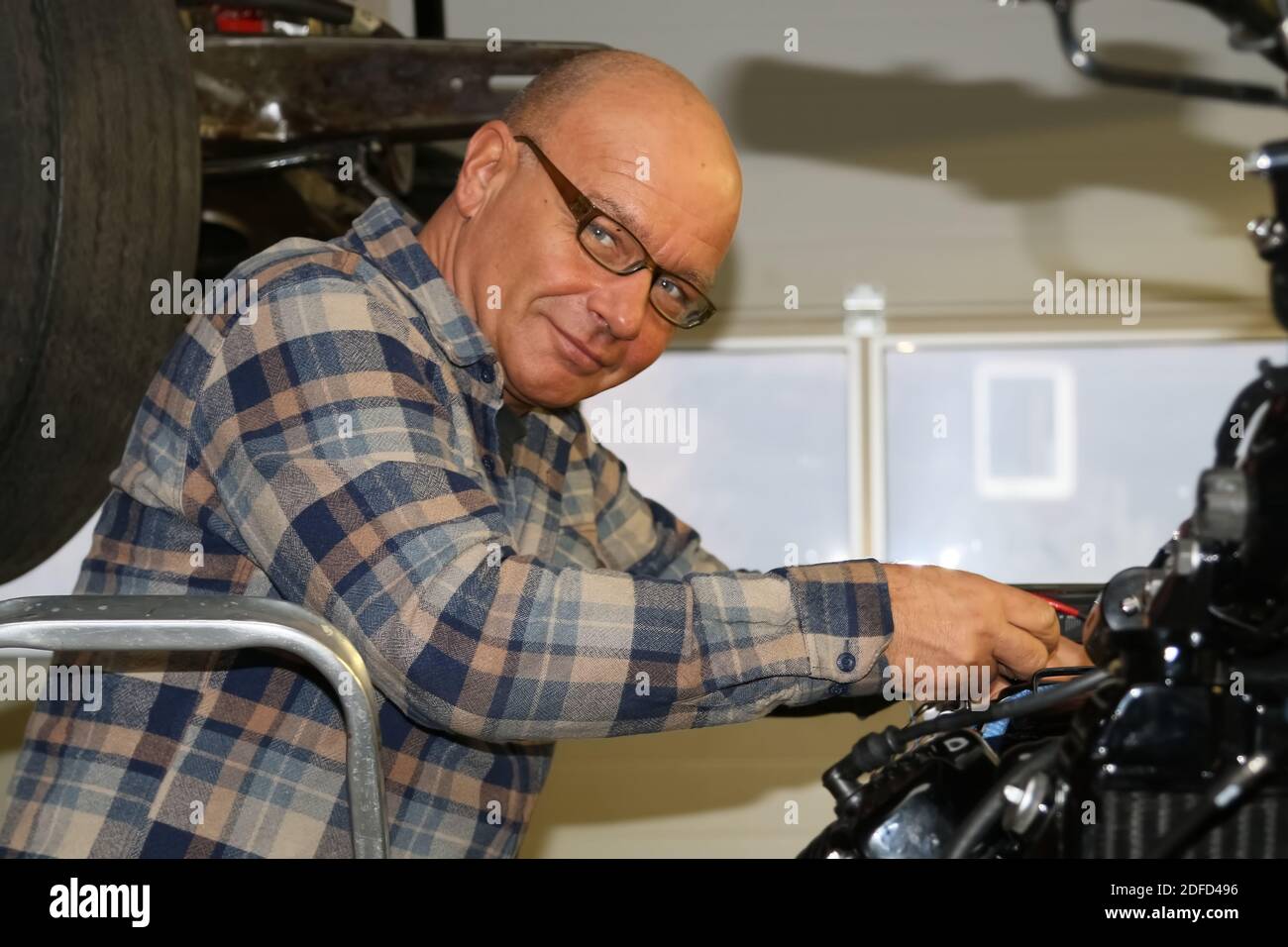 motorcycle mechanic at work Stock Photo - Alamy