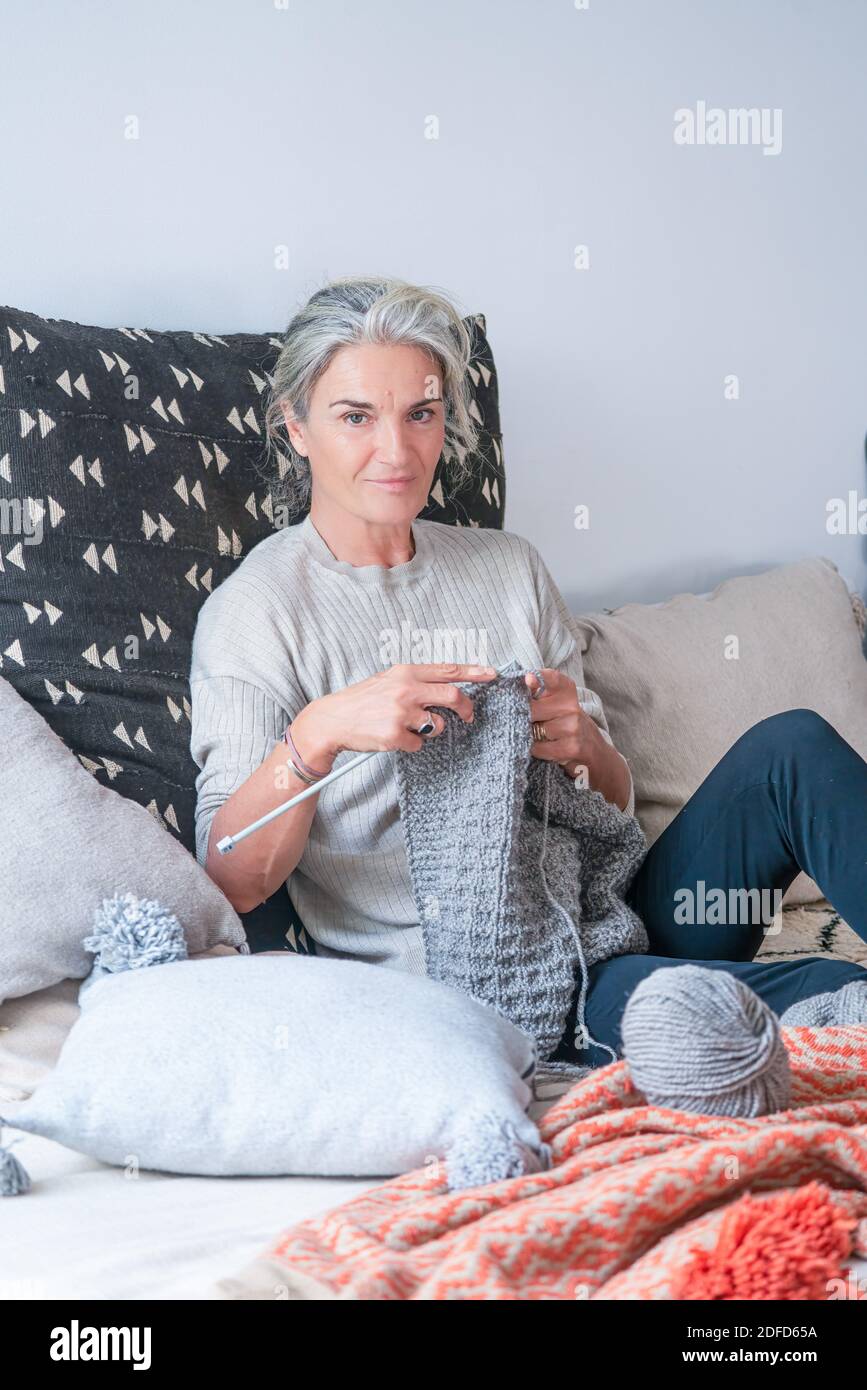 Woman knitting not young middle hi-res stock photography and images - Alamy