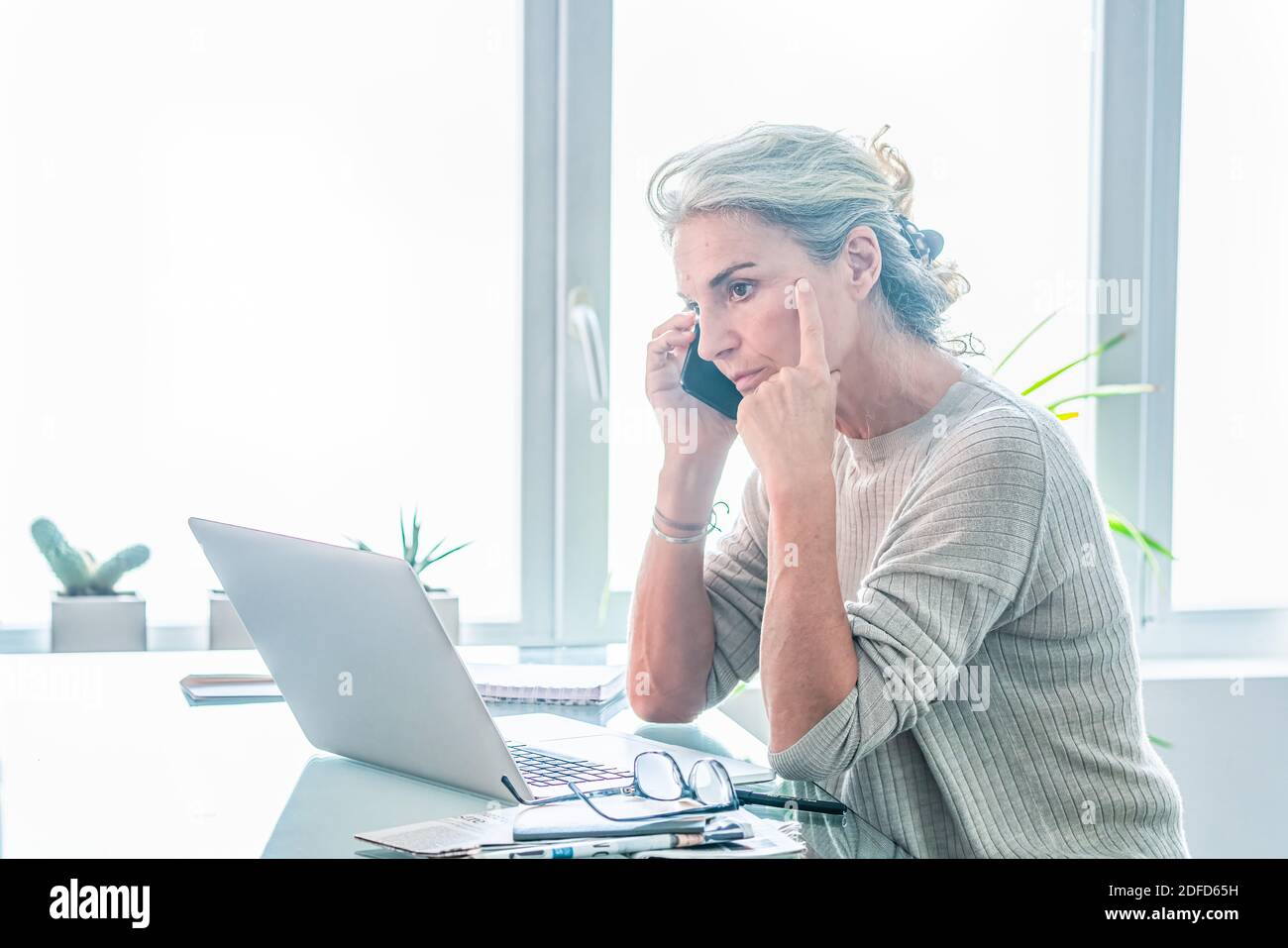 Senior woman using computer Stock Photo - Alamy Senior woman using computer Stock Photo - Alamy