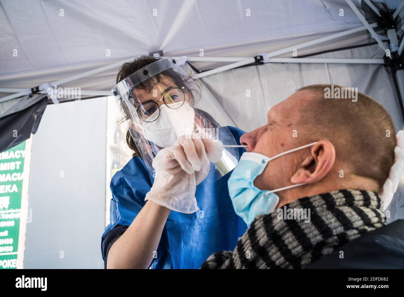 Private nurse in partnership with a pharmacy carries out an antigenic ...