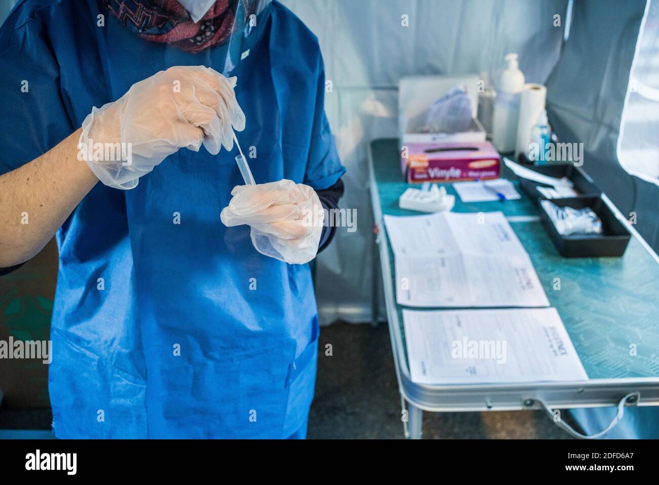 Private nurse in partnership with a pharmacy carries out an antigenic ...