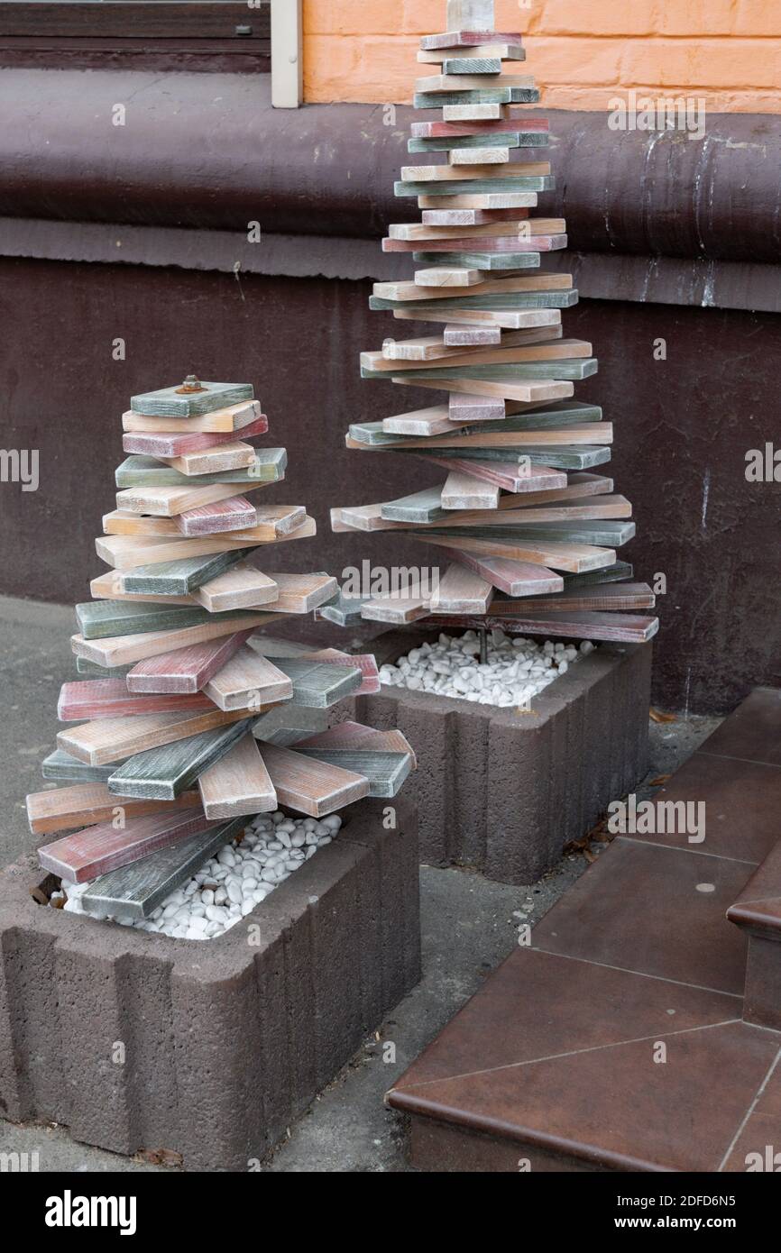 Recycled eco friendly Christmas trees of pyramid shape made from ...
