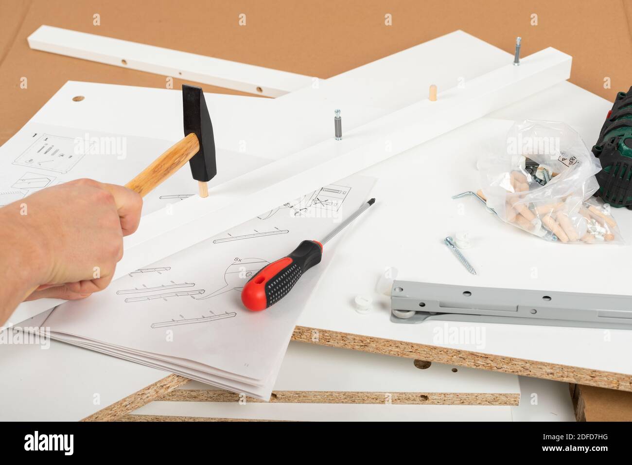 Close up picture of carpenter tools for furniture assembling at home ...