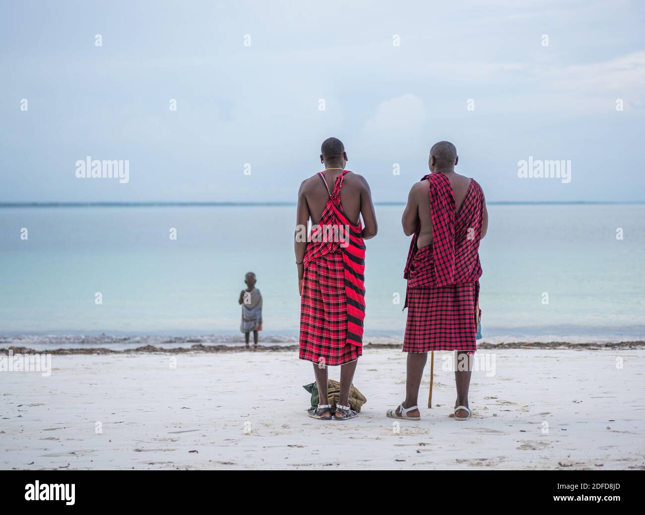 African tribe men on beach Stock Photo - Alamy