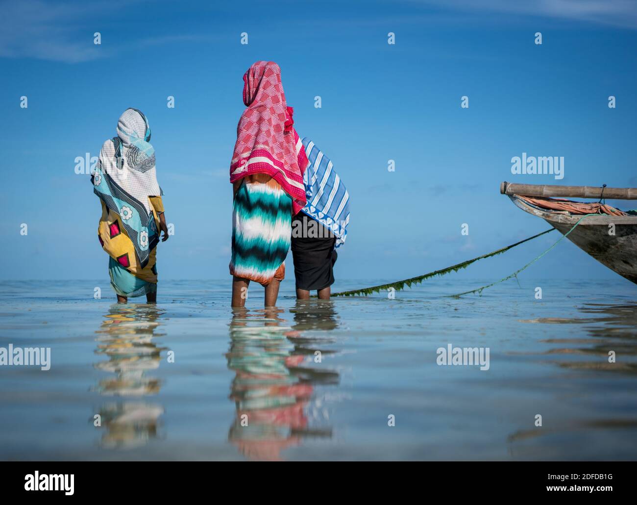 Muslim girls in tropical sea water Stock Photo - Alamy