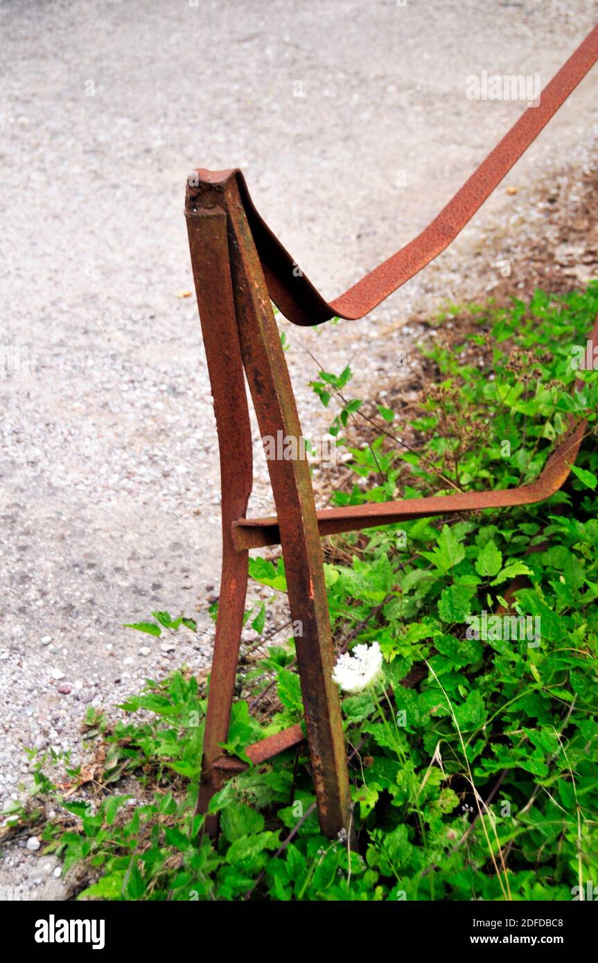 Abstract detail of rusty, bent metal-work by the road, Greek ...