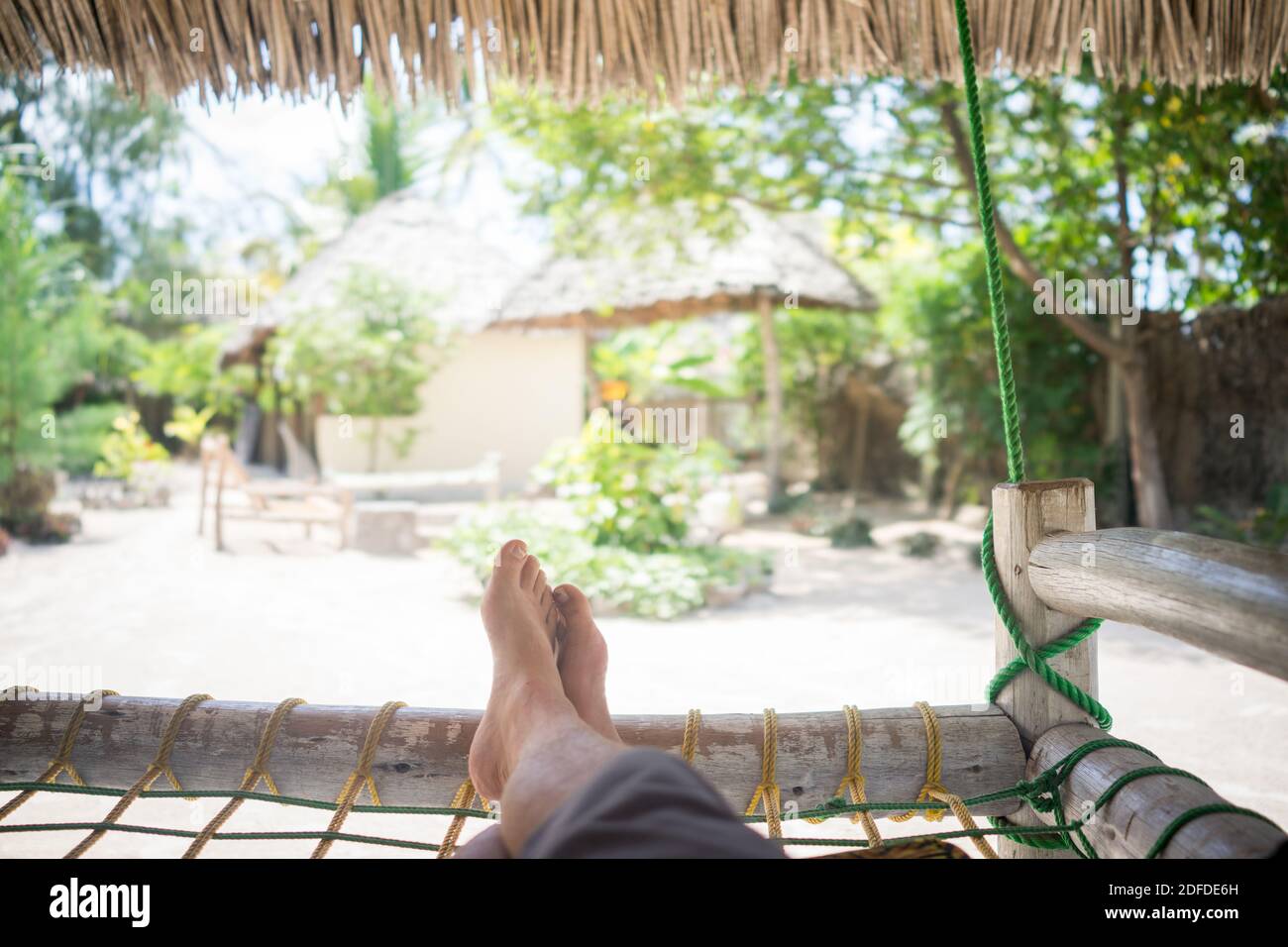 Relaxing on hammock Stock Photo - Alamy