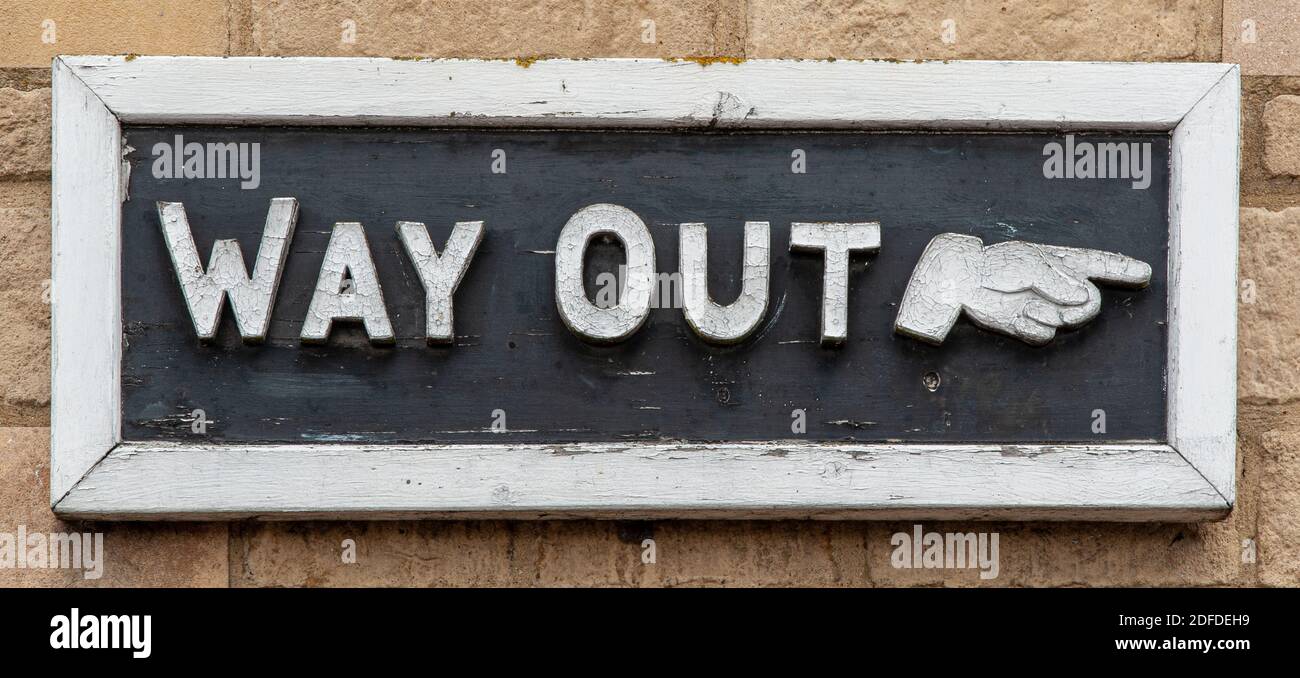 Vintage 'Way Out' sign on a wall Stock Photo - Alamy