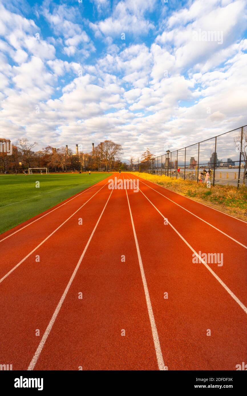 Autumn clouds cover the John V. Lindsay East River Park Running Track ...
