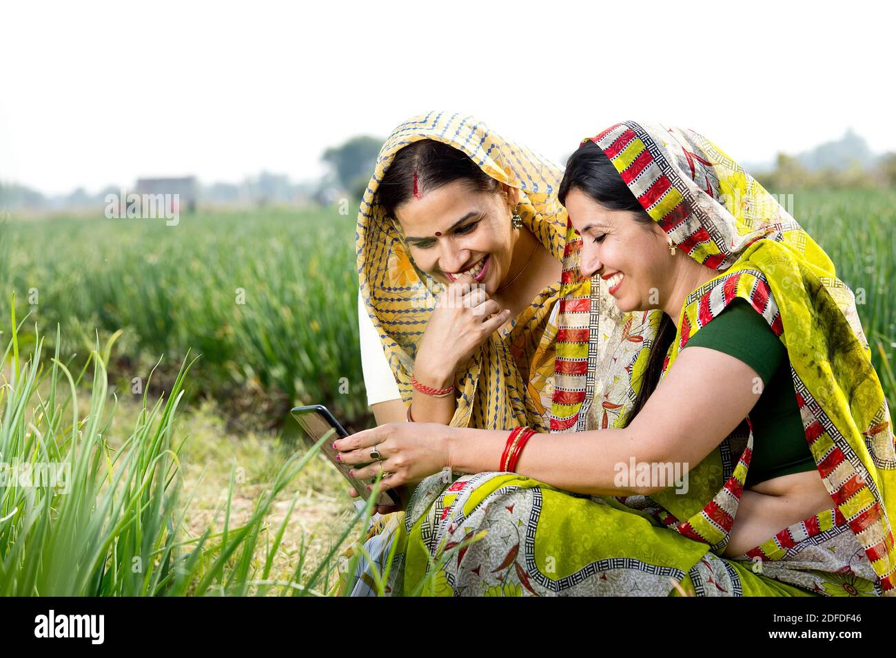 Indian village woman reading hi-res stock photography and images - Alamy