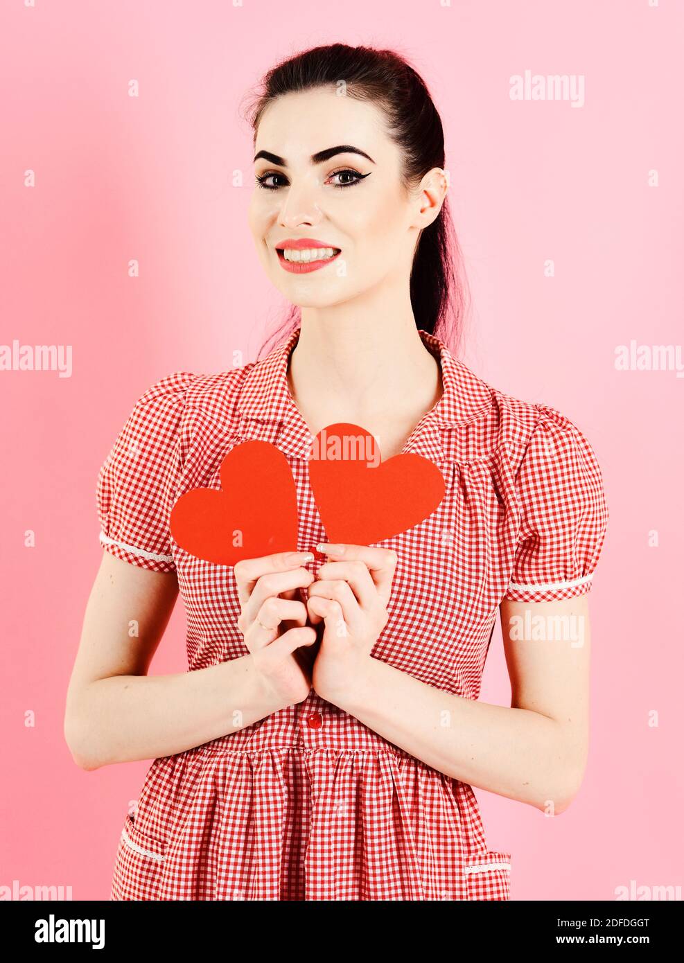 Flirt and love concept. Young woman with red hearts. Flirt and positive ...