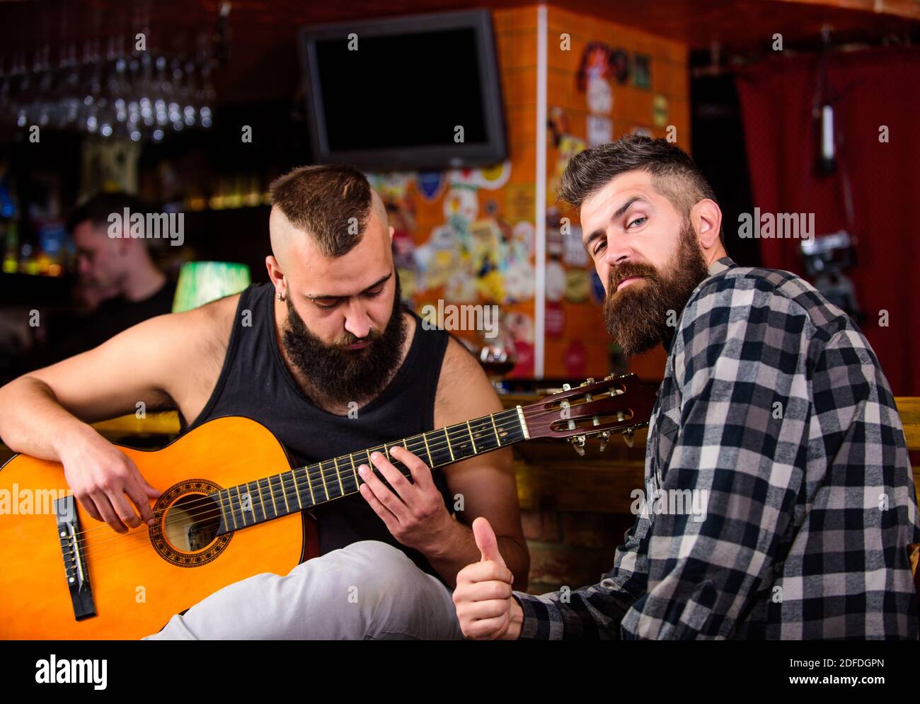 Live music concert. Acoustic performance in pub. Hipster brutal bearded ...
