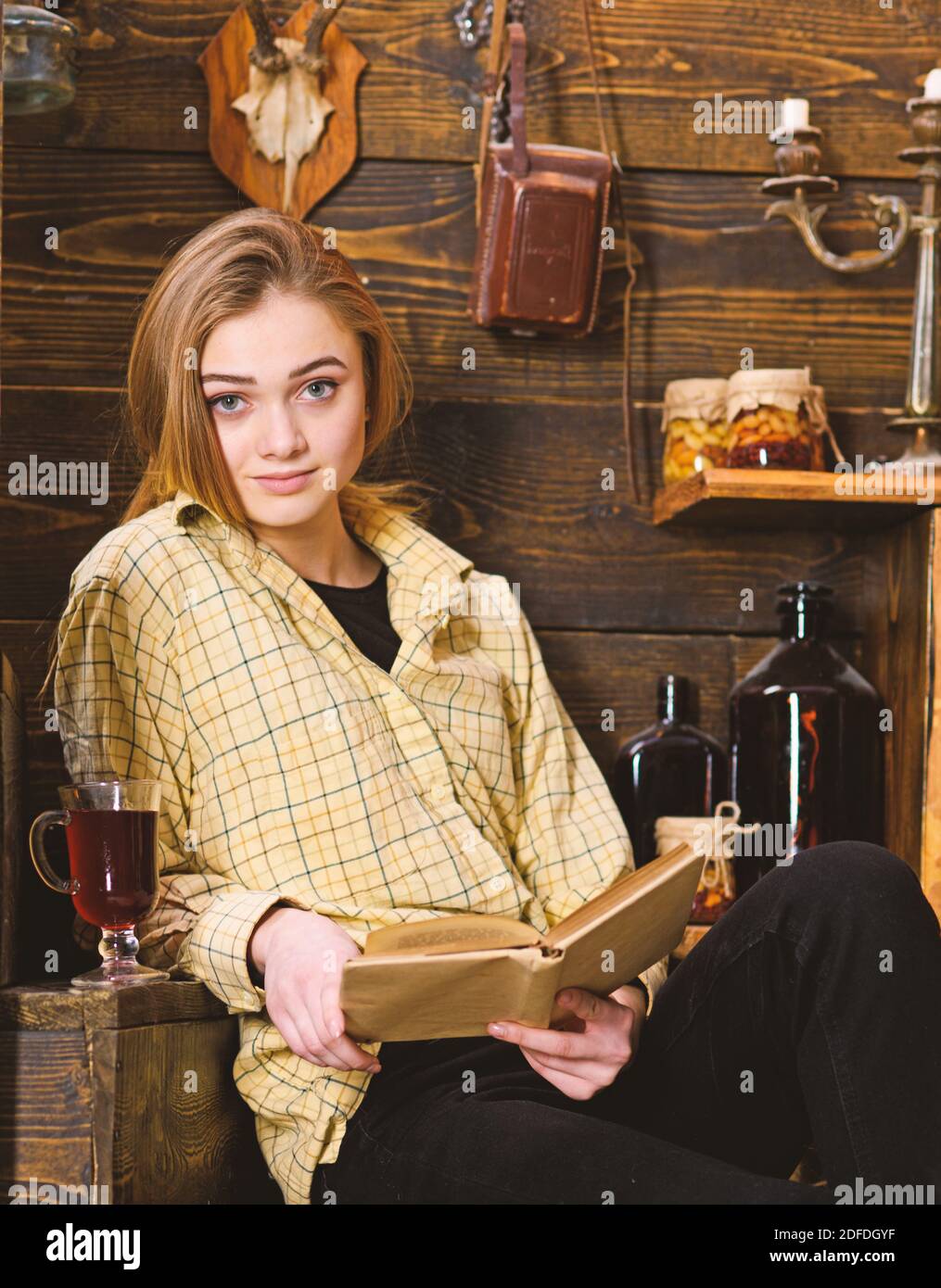 Study concept. Girl student study with book in house of gamekeeper ...