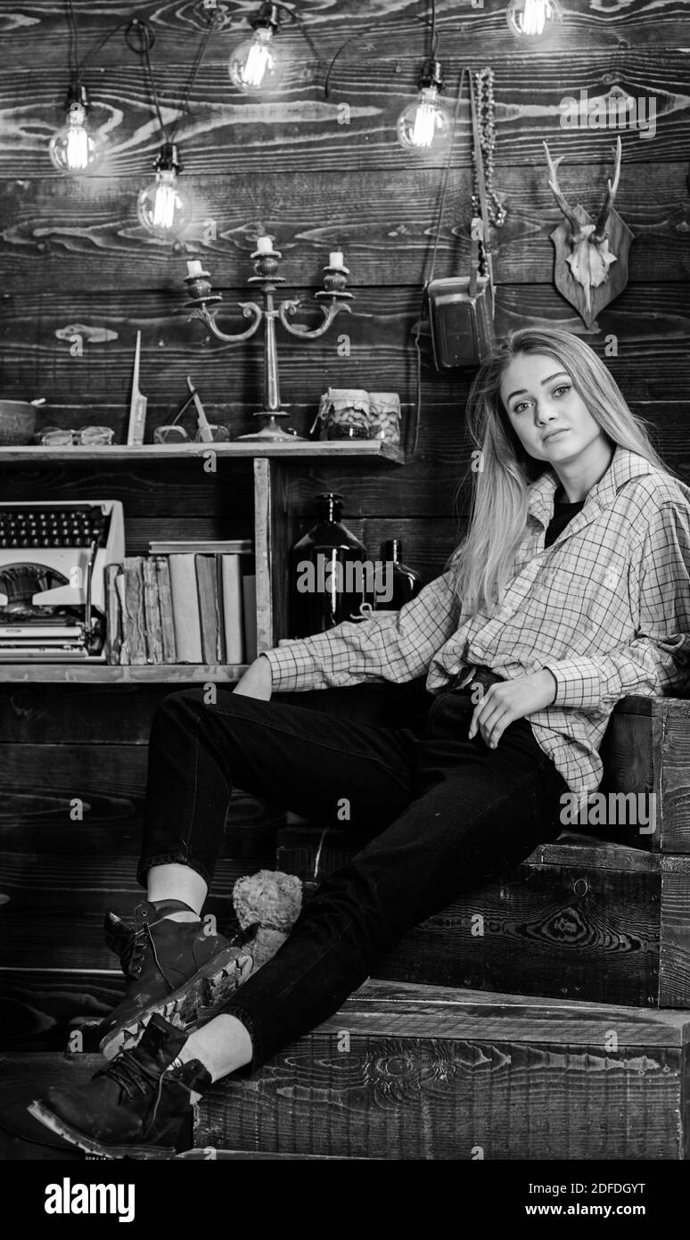 Lady on dreamy face in plaid clothes looks cute and casual. Girl tomboy ...