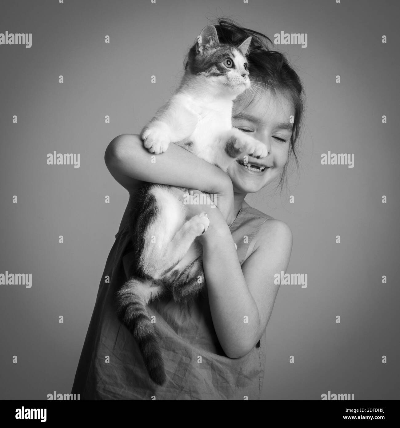 Child and cat Black and White Stock Photos & Images - Alamy