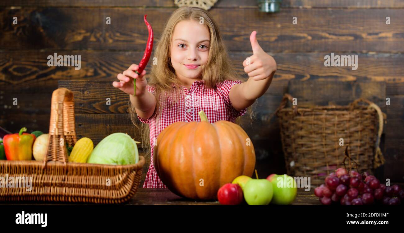 Girl kid at farm market with fall harvest. Child little girl celebrate ...