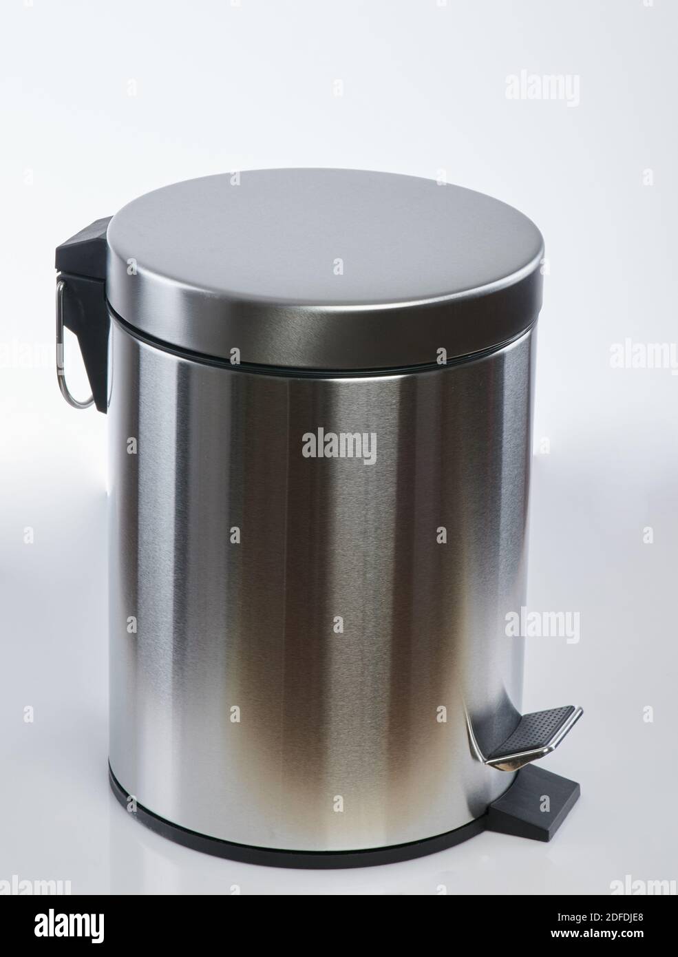 One closed waste basket isolated on white background Stock Photo - Alamy