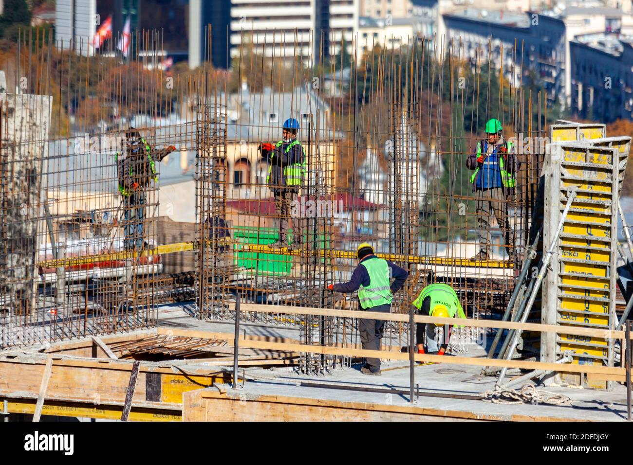 Tbilisi, Georgia - 23 November, 2020: Construction workers work on high ...