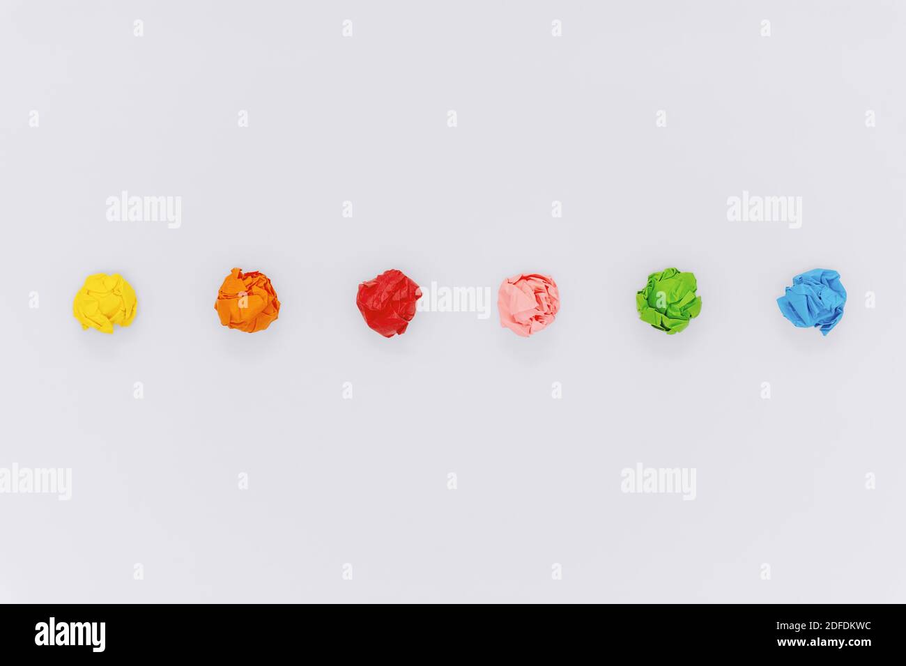 Overhead View of Multi Colored Crumpled Paper Ball in a Row Stock Photo ...