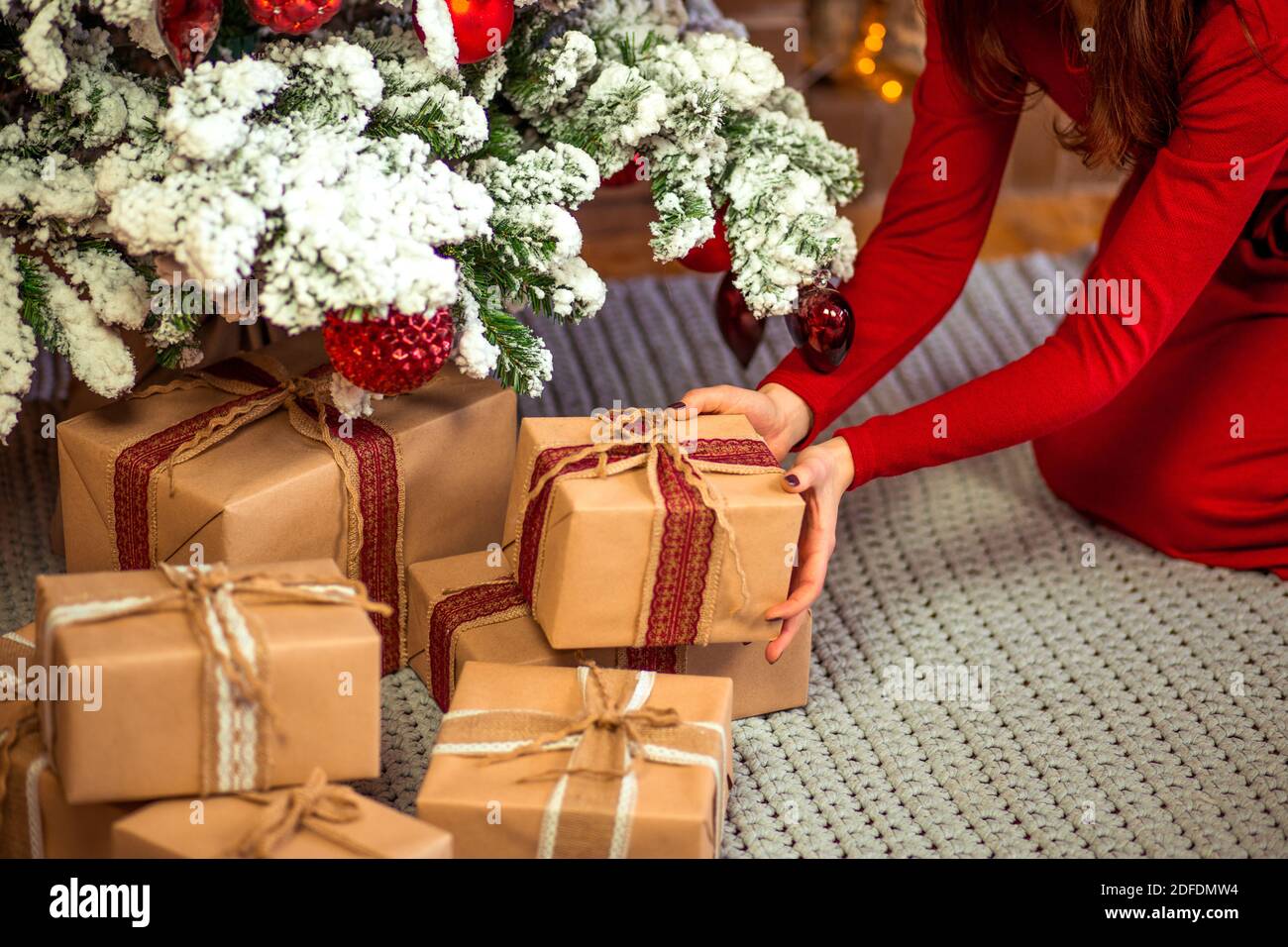 Christmas presents under a tree hi-res stock photography and images - Alamy