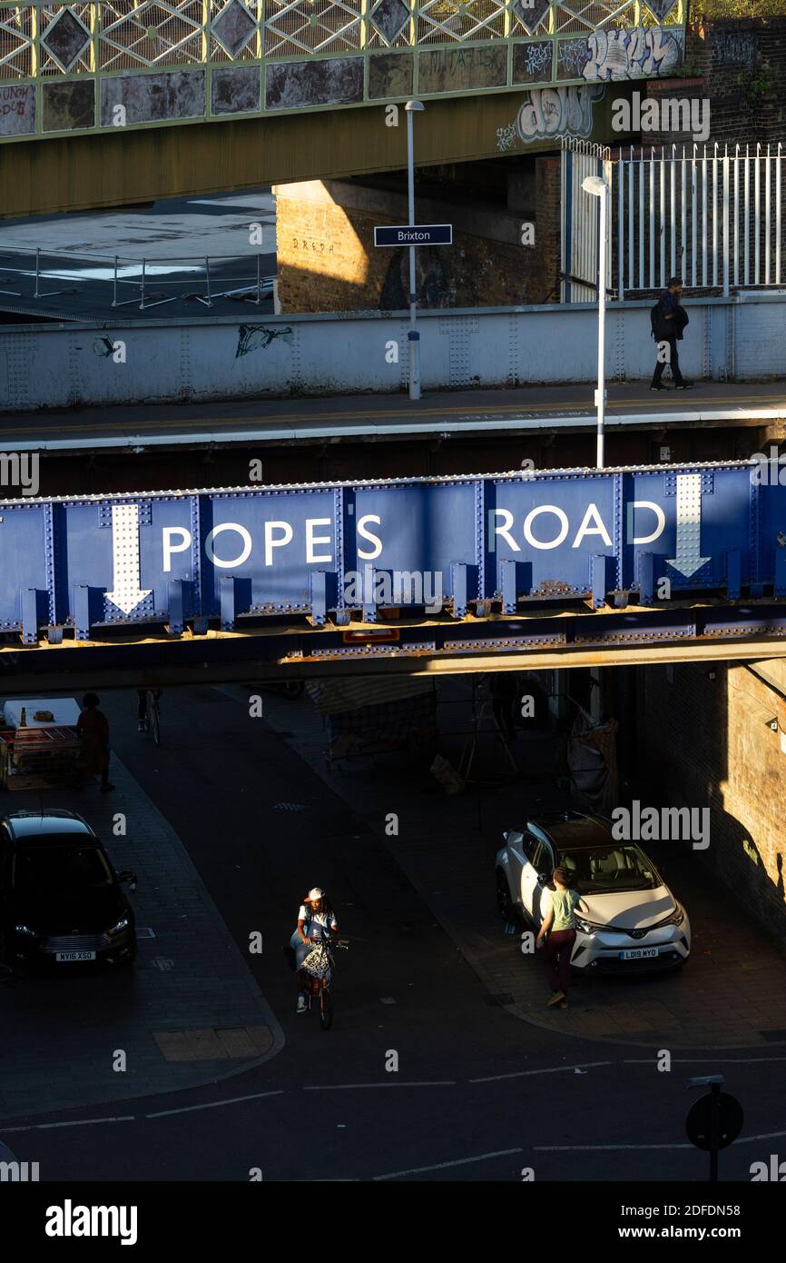 The train overpass above Pope's Road, Brixton, London Stock Photo - Alamy