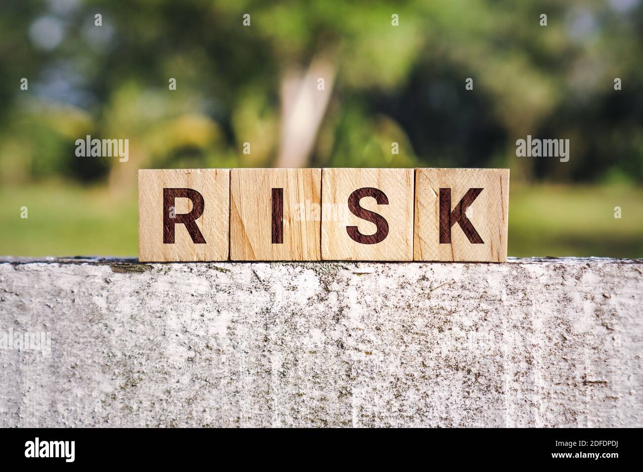 Wooden Block With The Word Risk Stock Photo - Alamy