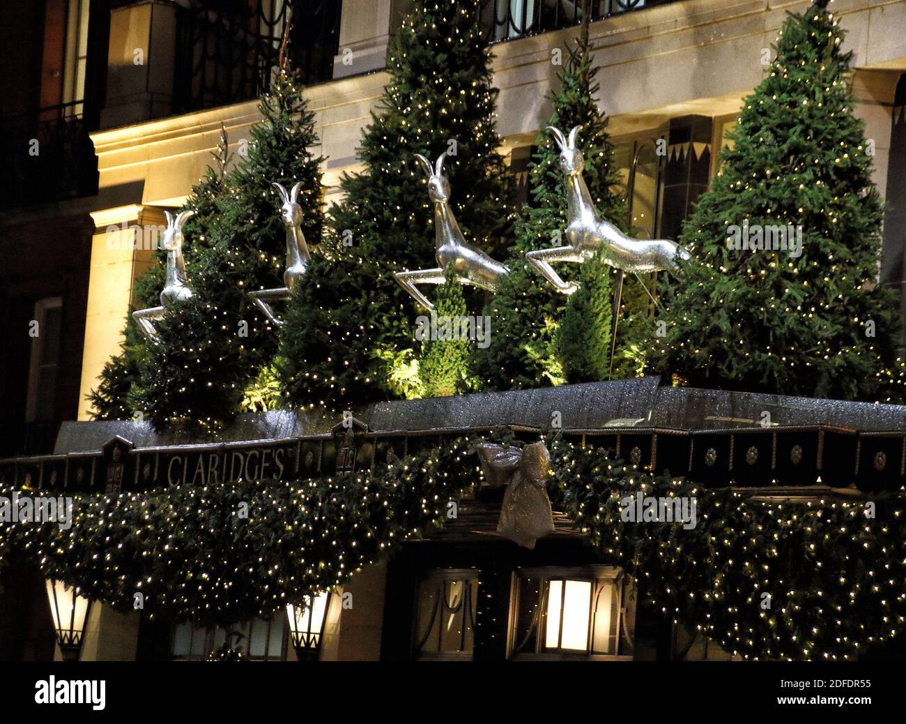 London, UK. 3rd Dec, 2020. Reindeer models on top of Claridges hotel in ...