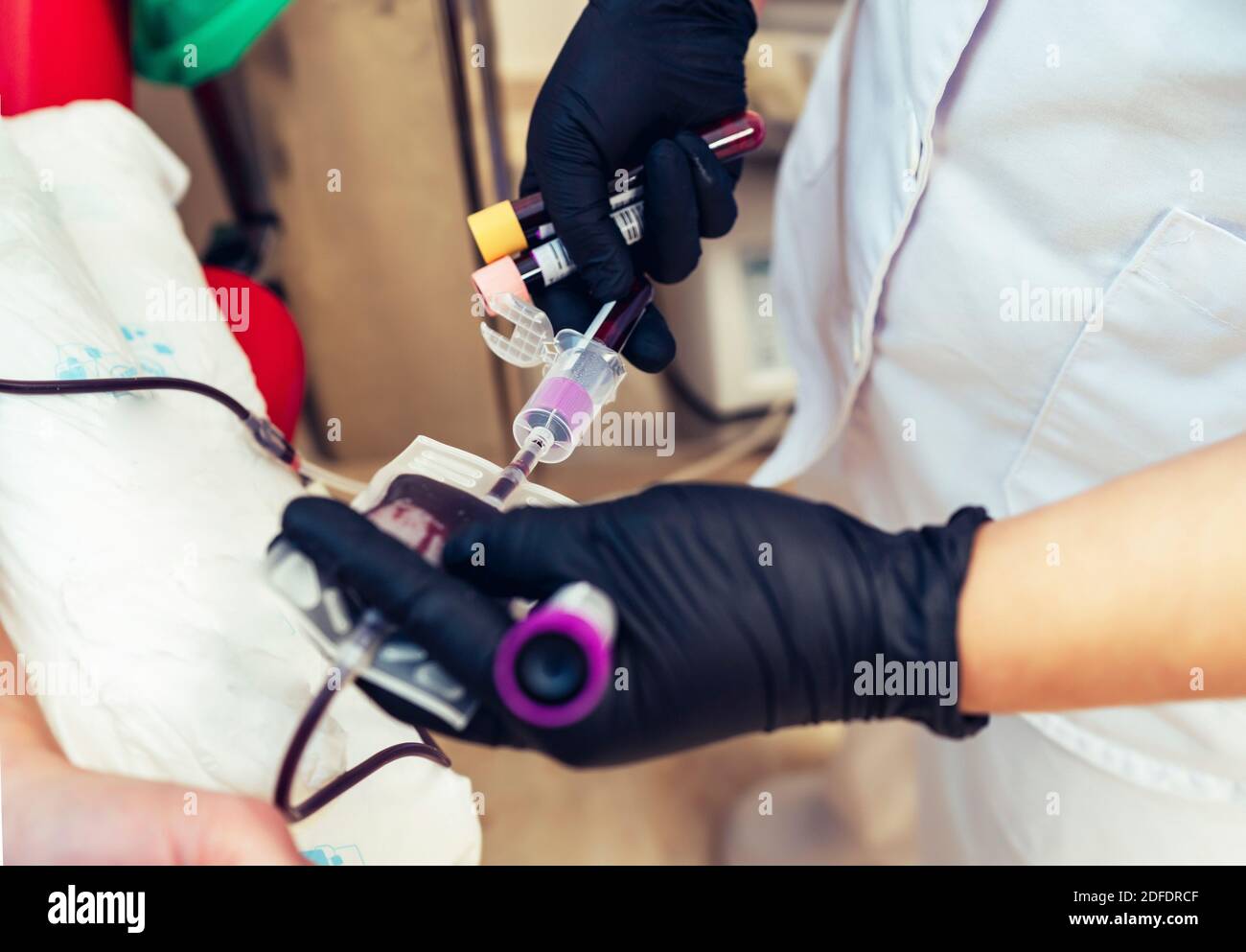 female doctor with blood donation test tubes Stock Photo - Alamy