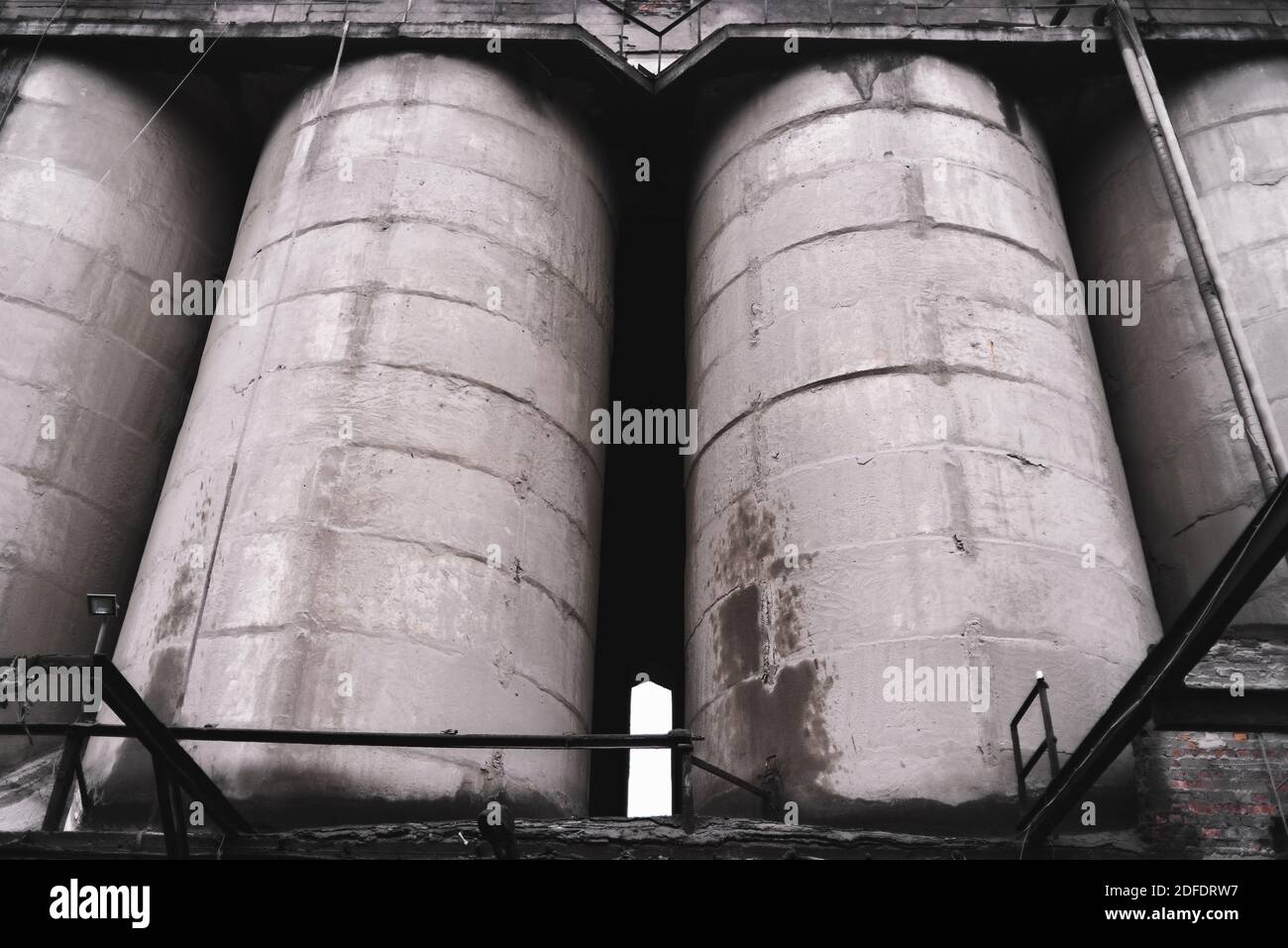 Concrete cylinder factory storage building Stock Photo - Alamy