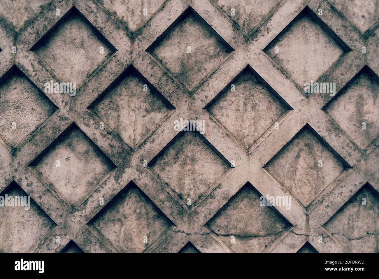 Concrete wall with rhombus shapes texture Stock Photo - Alamy