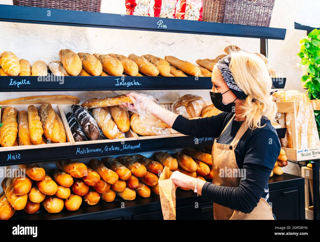 Baker selling hi-res stock photography and images - Alamy