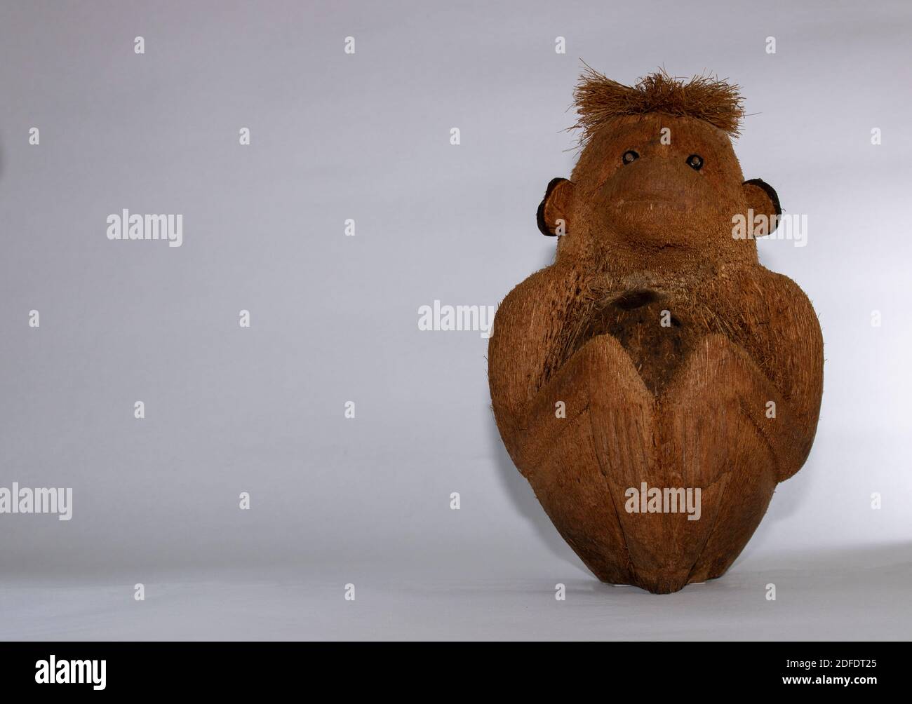 carved monkey doll made out of coconut Stock Photo - Alamy