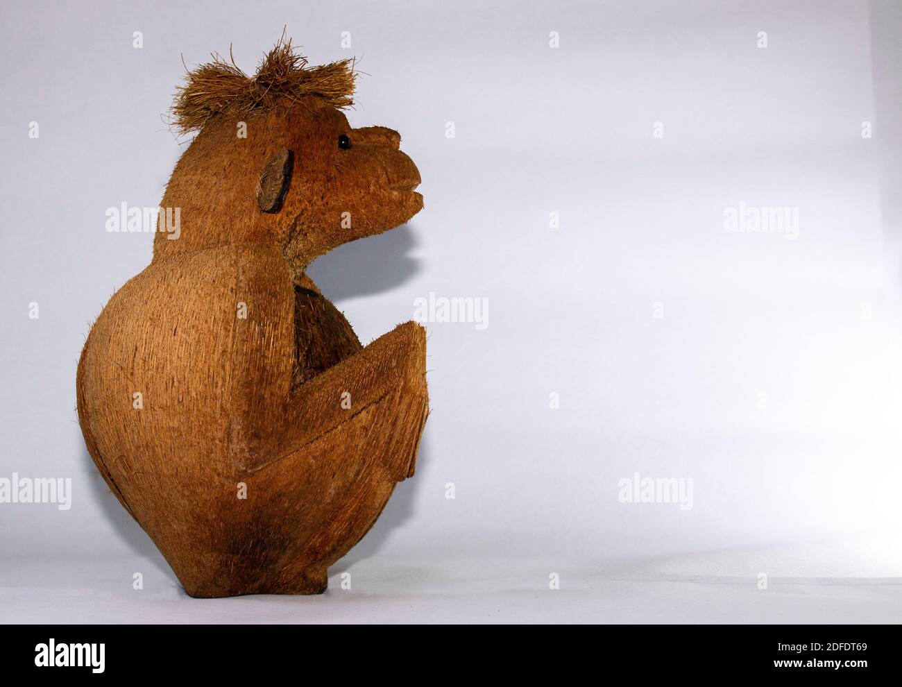carved monkey doll made out of coconut Stock Photo - Alamy