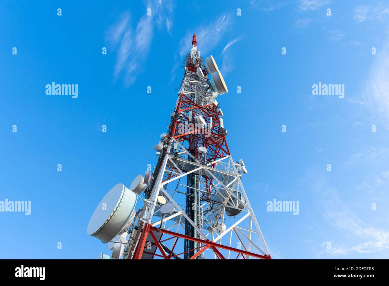 a radio communication antenna on blue sky background Stock Photo - Alamy