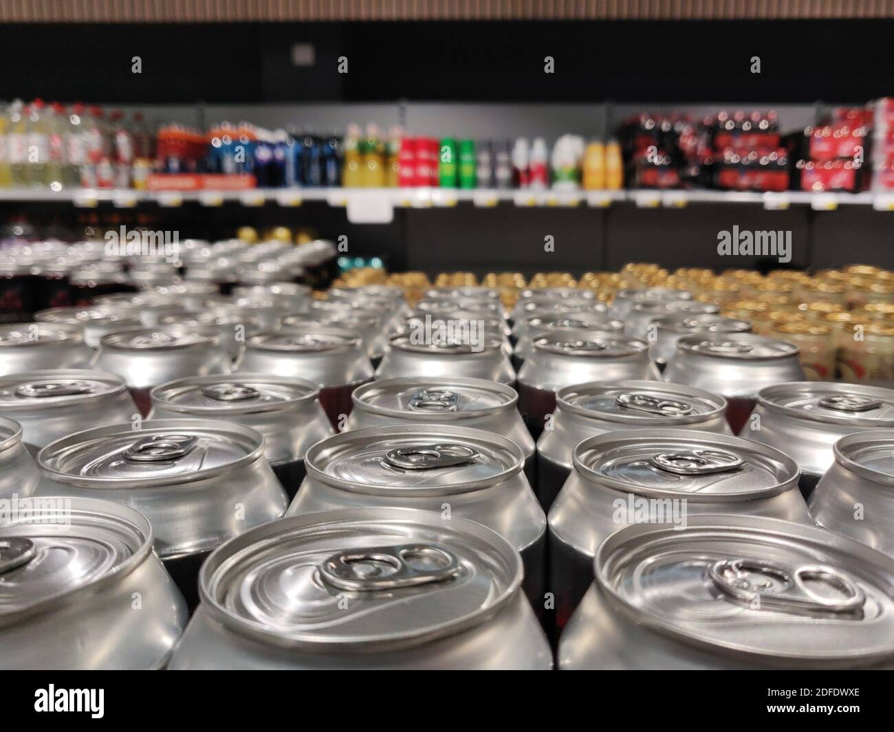 A closeup of arranged aluminum cans, mass production Stock Photo - Alamy
