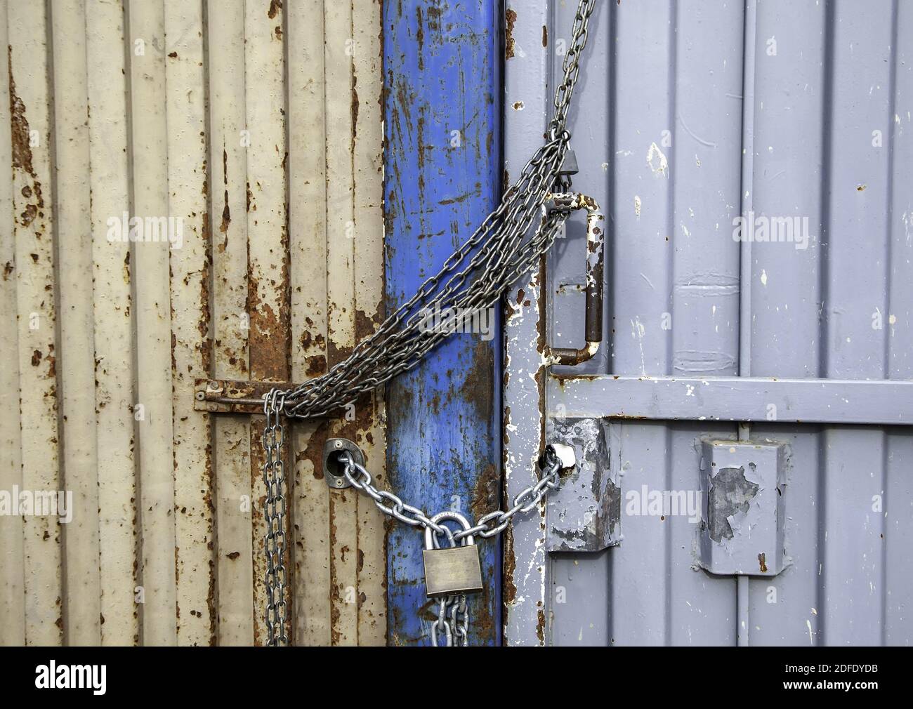 Chain and padlock industrial door, construction and architecture ...
